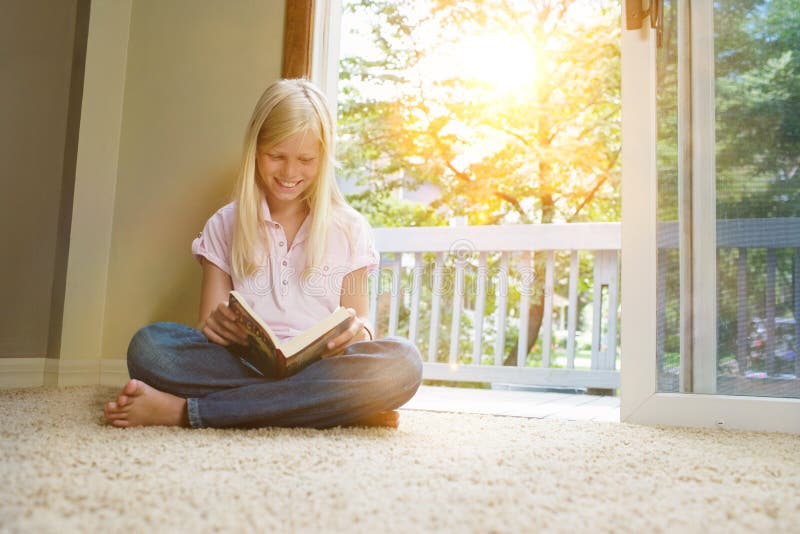 Girl Sitting on Carpet, Reading Book Stock Image - Image of sofa, home ...