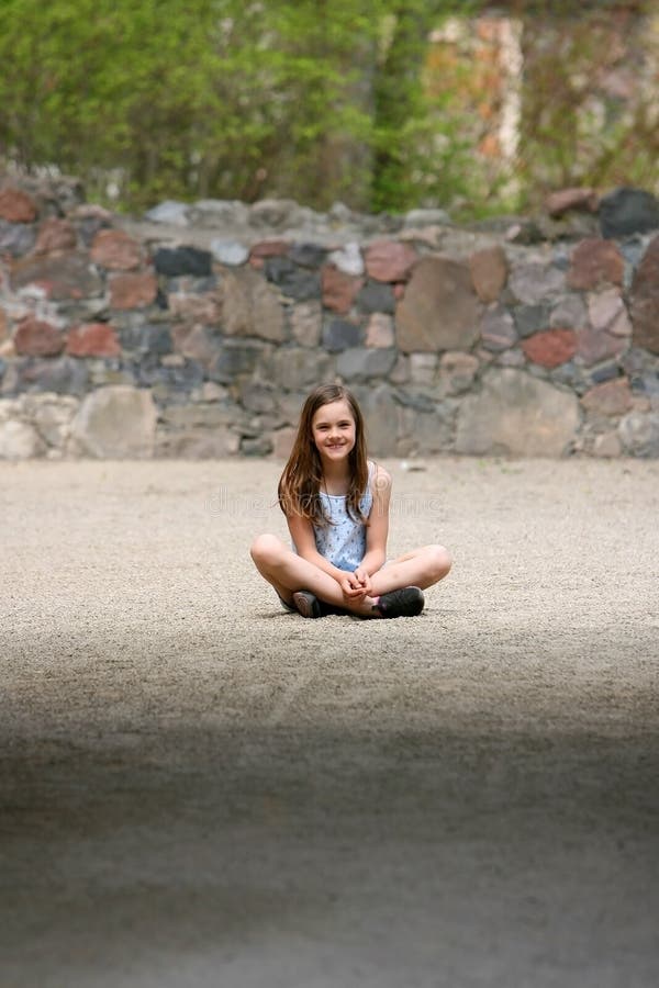 Girl Sitting Cross-legged Picture. Image: 3639186