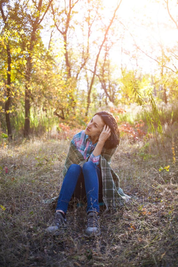 Girl sitting on the grass. stock image. Image of loneliness - 60458647