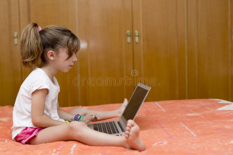 Girl sitting with a laptop stock image. Image of laptop - 72370729