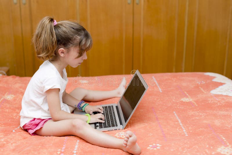 Girl sitting with a laptop stock image. Image of technology - 72370735