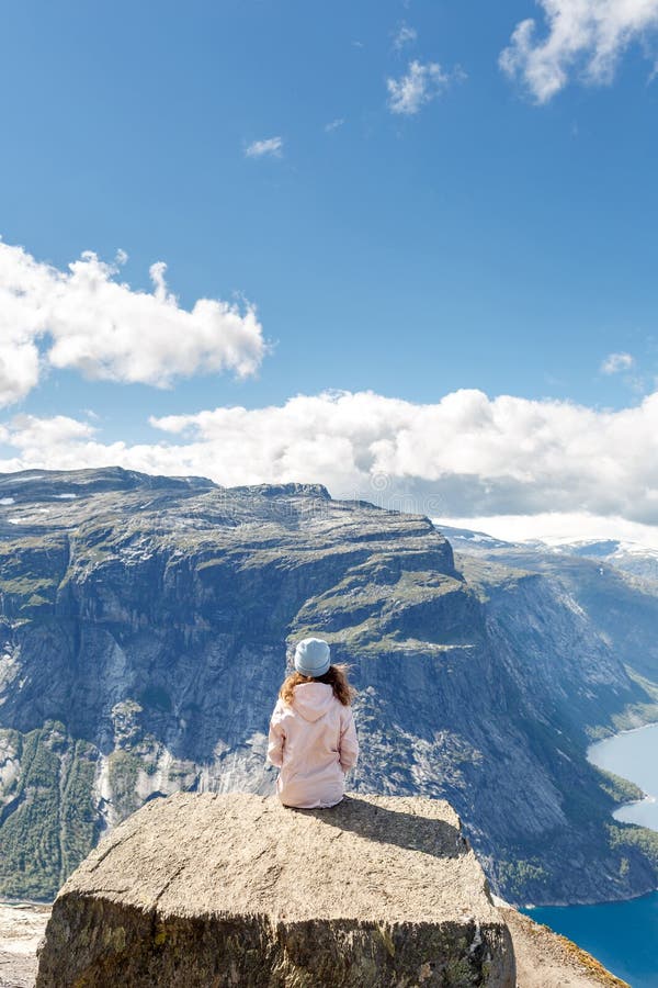 Girl Sitting on a Parapet and Looking at the Fine Landscape Stock Image ...