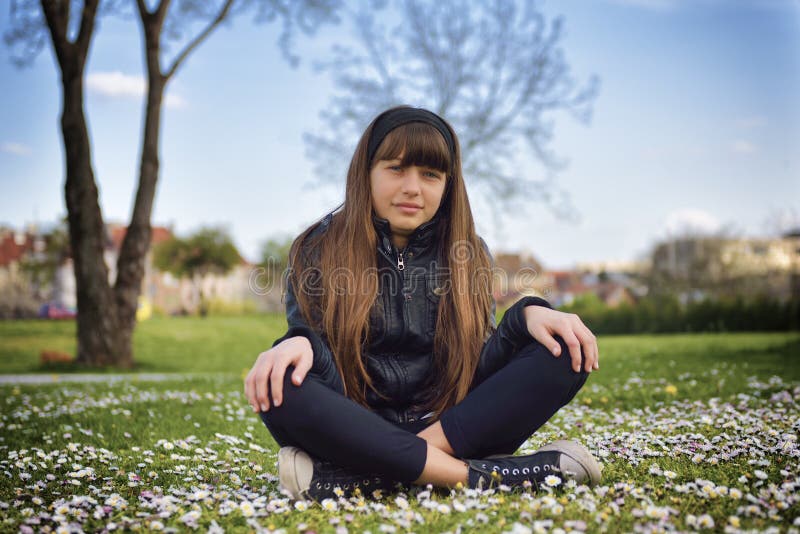 Girl Sitting in the Park stock image. Image of white - 39137877
