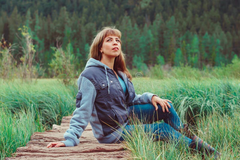A Girl is Sitting on a Path in the Forest Stock Photo - Image of summer ...