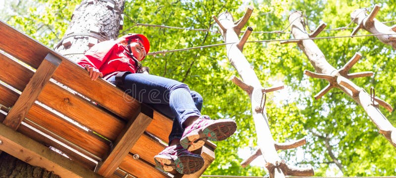 Girl Sitting on Platform in High Rope Course Resting Stock Image ...