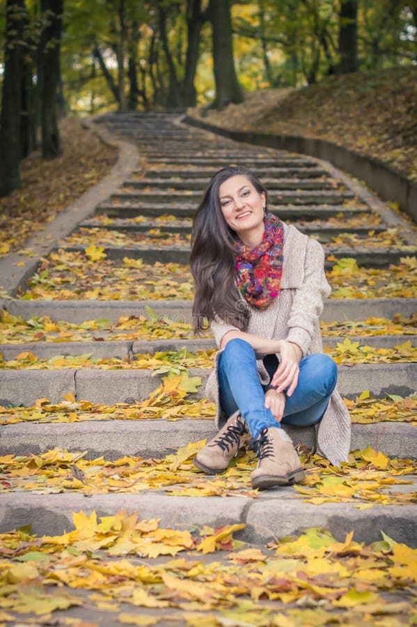 Girl Sitting on Stone Steps Stock Image - Image of park, fashion: 86408395