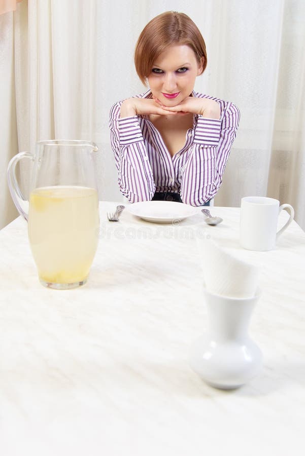 Girl Sitting at a Table in a Cafe Stock Image - Image of cafe, table ...