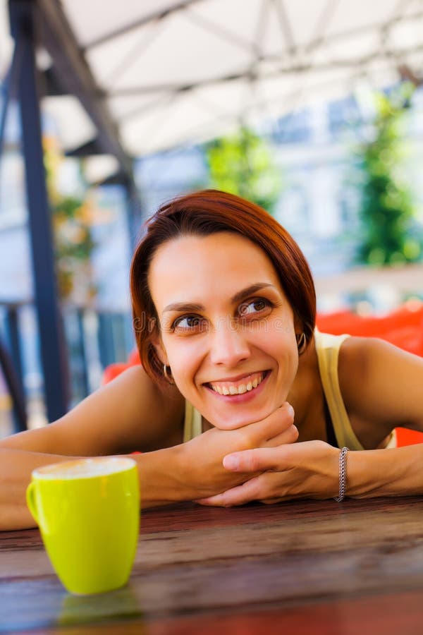 The Girl Sitting at the Table. Stock Photo - Image of happy, leisure ...