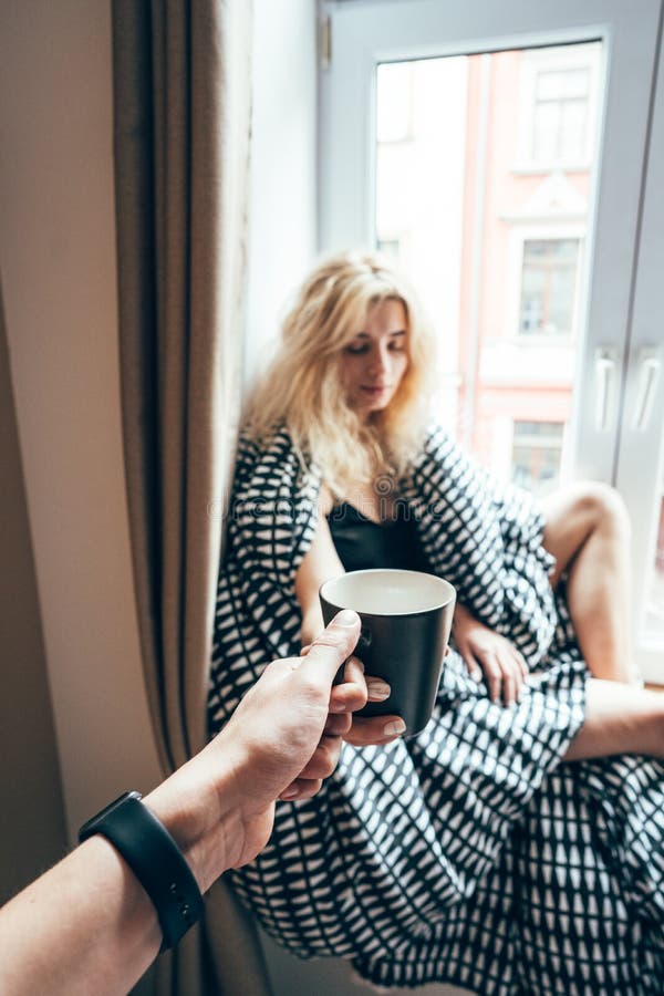 Girl Sitting on a Window in a Blanket Stock Image - Image of comfort ...