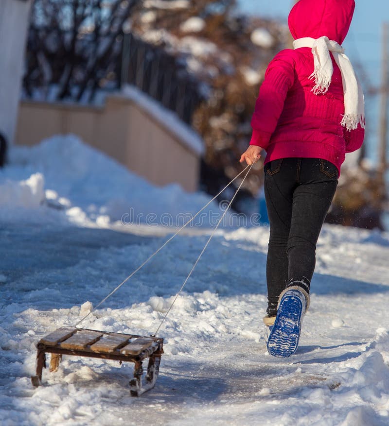 Girl with Sled in the Snow in Winter Stock Photo - Image of girl ...