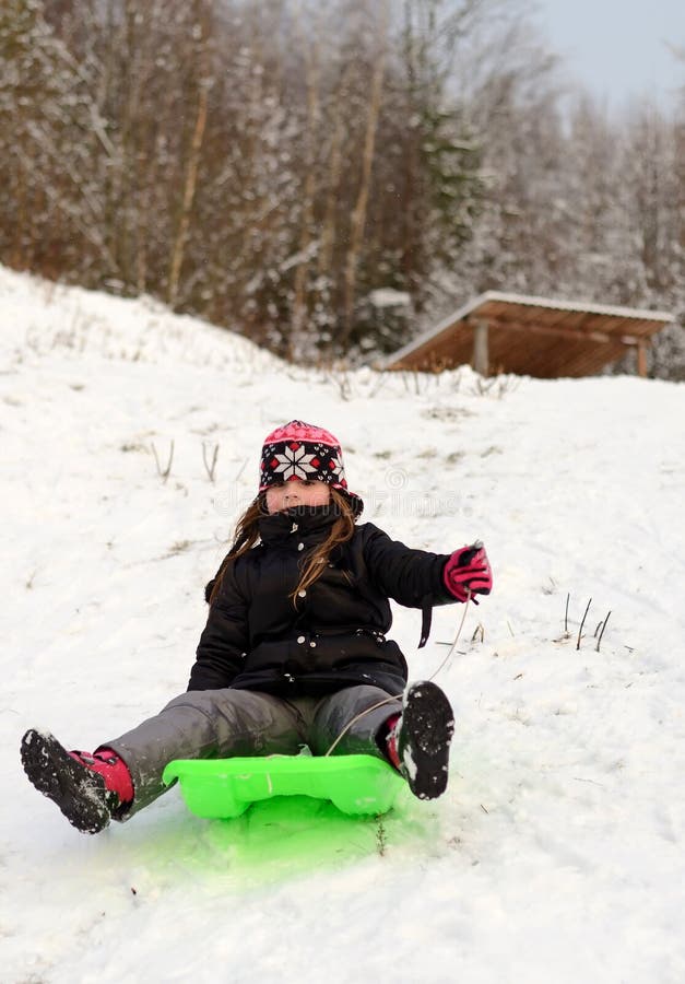 Girl sledding stock photo. Image of little, riding, lifestyle - 22981480