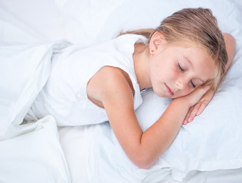 Girl sleeping in white bed stock image. Image of portrait - 32634787