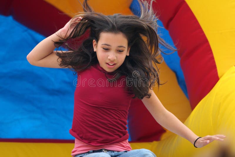 Girl on the slide stock image. Image of sliding, hair, action - 640169