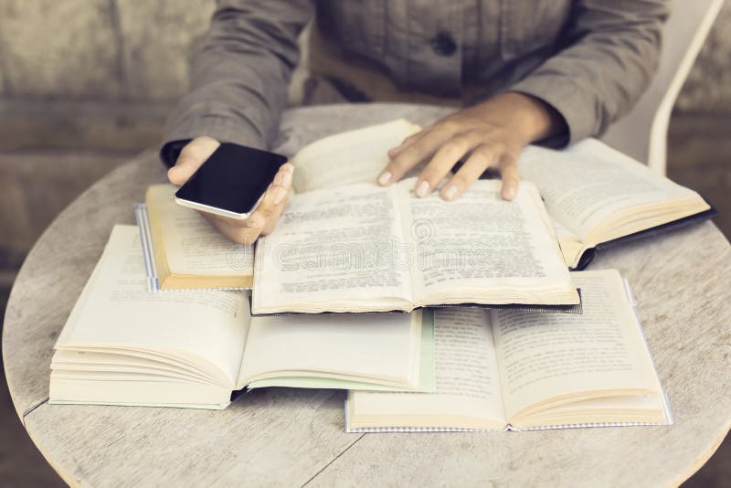 Girl with Smartphone and Open Books Stock Photo - Image of cellphone ...