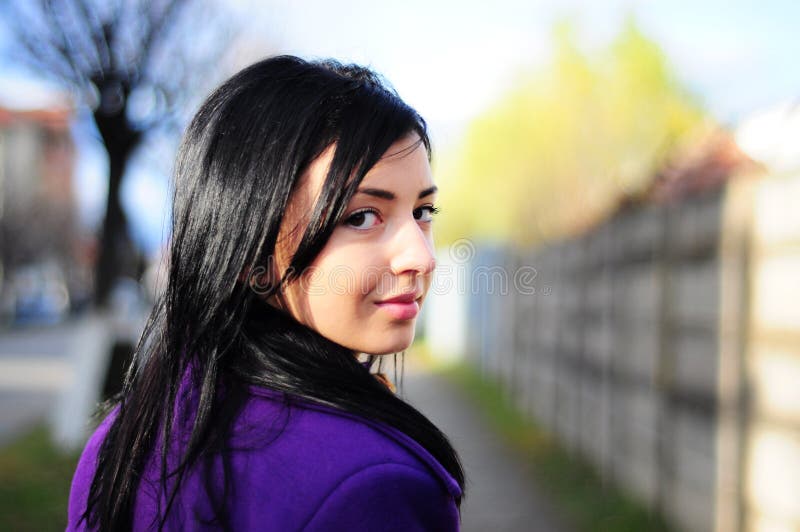 Girl smiling looking back stock image. Image of outdoors - 17129317