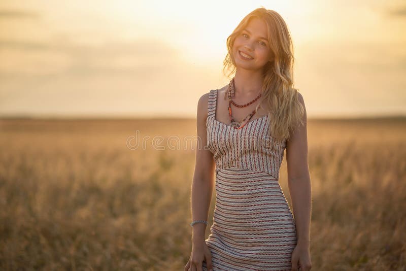 Girl smiling at sunset stock image. Image of happiness - 81055365