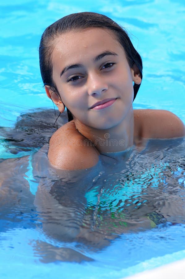 Girl Smiling in a Swimming Pool Stock Image - Image of cute, childhood ...