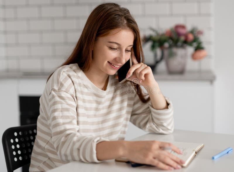 Girl Smiling while Talking on Phone Stock Photo - Image of talking ...