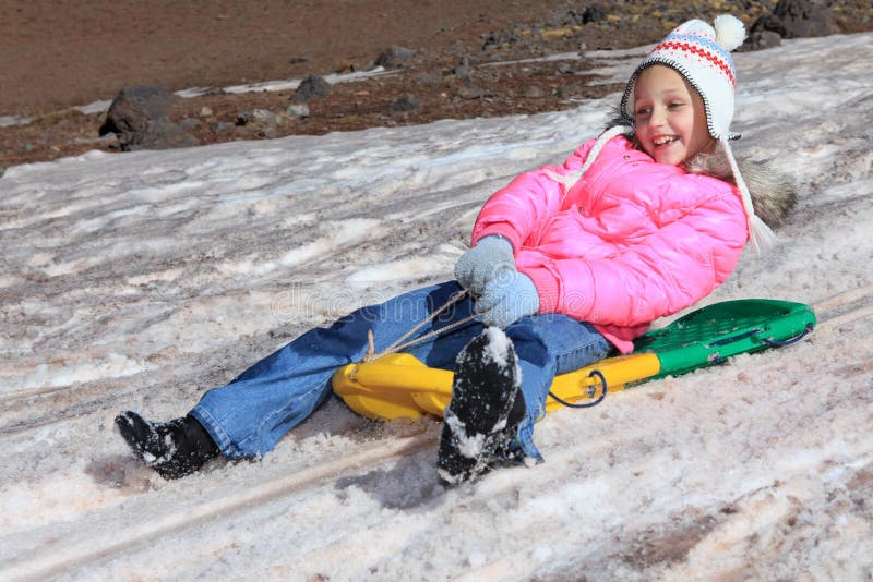Girl snow sliding stock photo. Image of girl, snow, vacations - 31693852