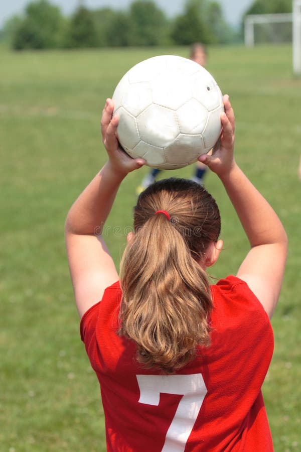 Girl at Soccer Field 25 stock image. Image of pass, grass - 2691613