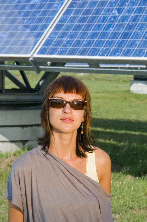Woman and solar panels stock photo. Image of gray, photovoltaic - 23762524
