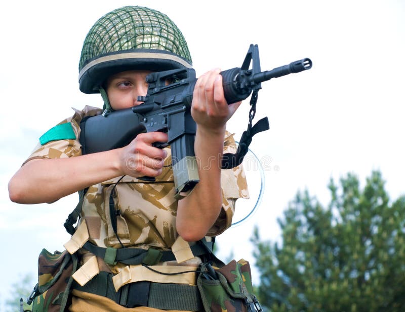 Girl soldier stock photo. Image of great, firing, aiming - 10448292