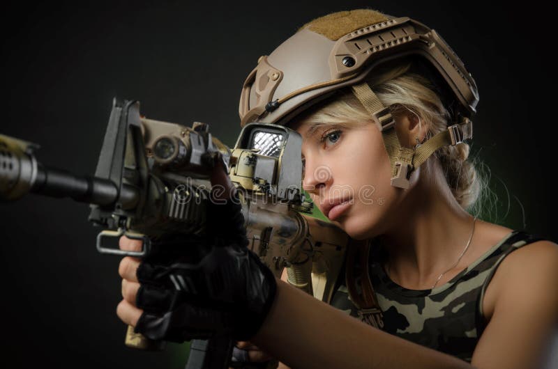 A Girl Soldier Armed with an Automatic Rifle Takes Aim Stock Image ...