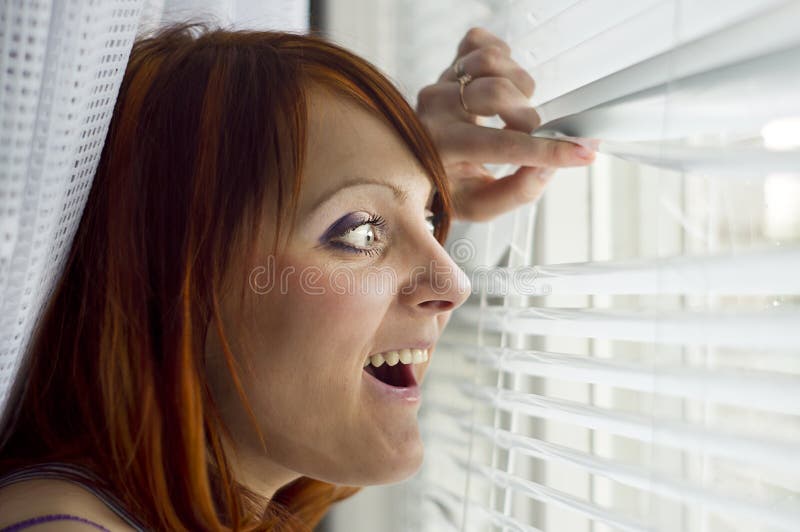Girl Spies through the Window Stock Image - Image of amazement, looking ...