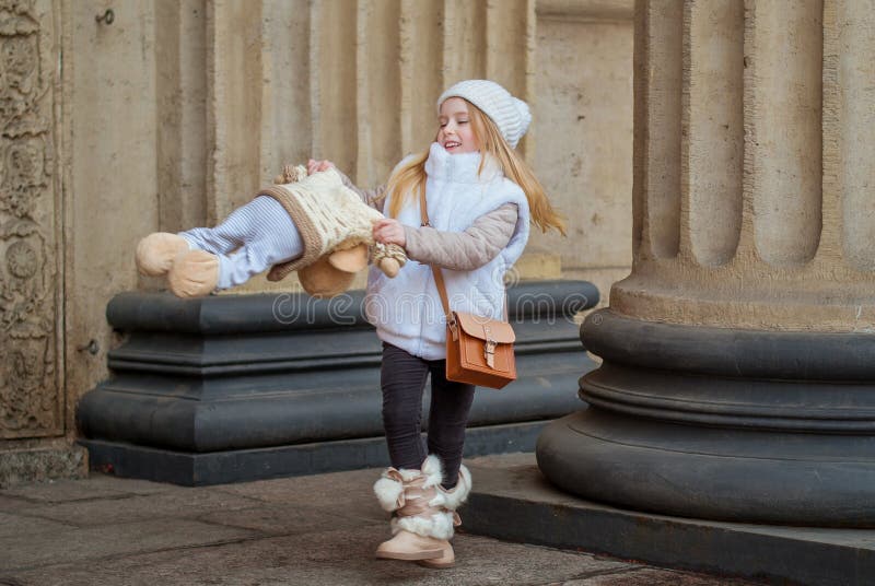 Girl Spinning with Plush Toy Stock Photo - Image of dialogue, blonde ...