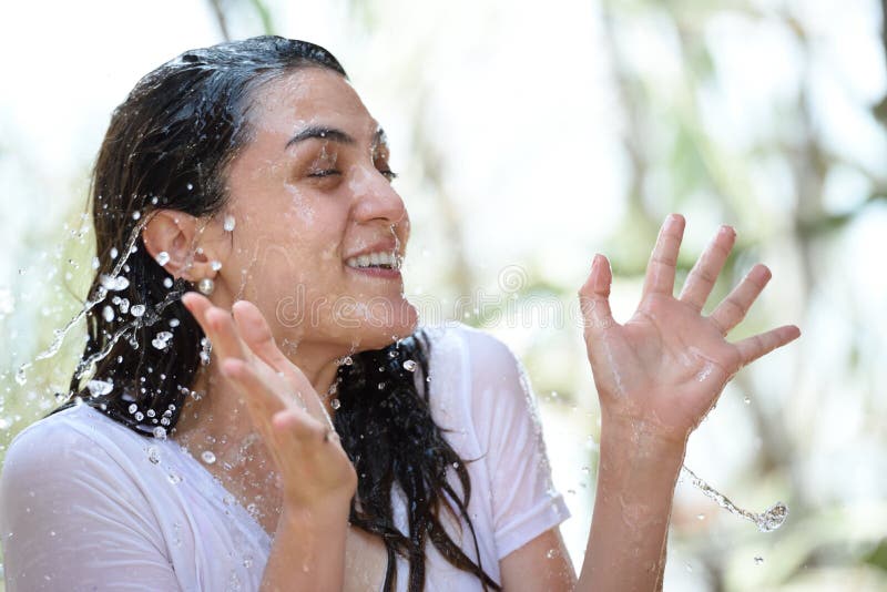 Girl splash face stock image. Image of happy, beauty - 69442649