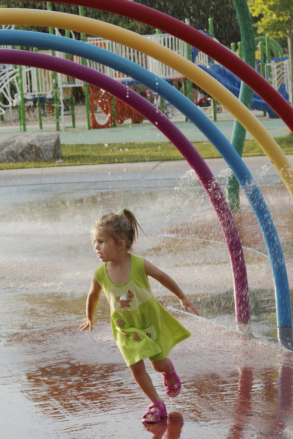 Girl at splash zone stock photo. Image of adorable, childhood - 20468086