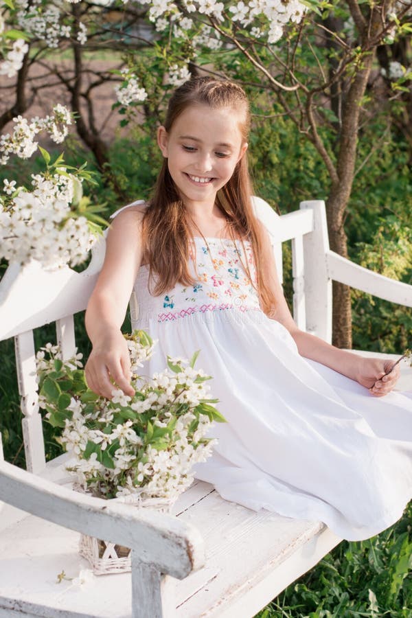 Girl with spring flower stock photo. Image of smiling - 35123274