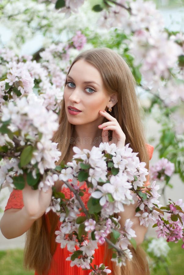 Girl in spring flowers stock photo. Image of beautiful - 25130752