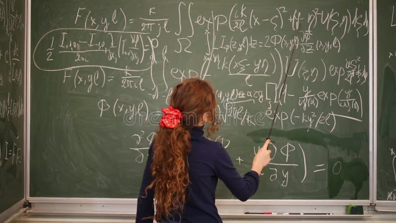 Girl Standing at Blackboard and Reading with Stock Footage - Video of ...