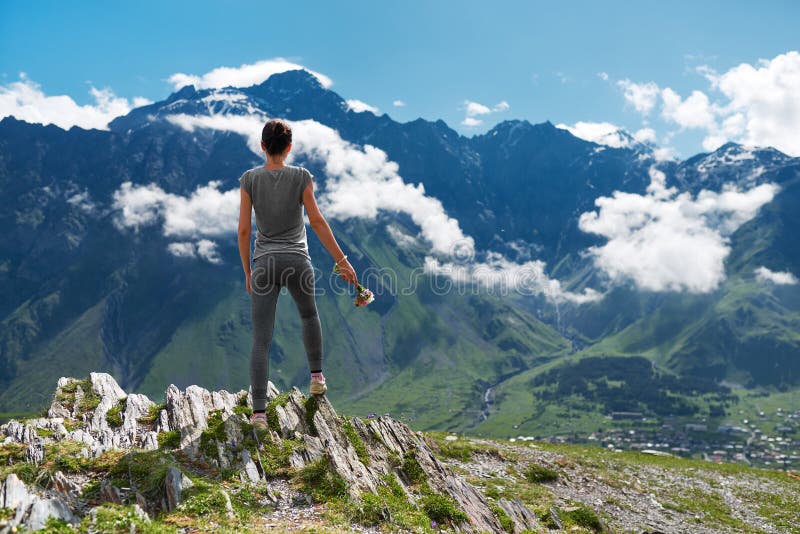 Girl Standing Edge of Cliff and Looking at Mountain Landscape Stock ...