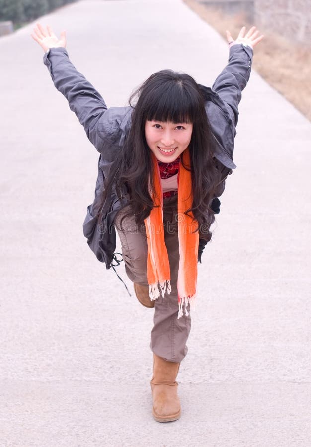 Girl Standing In The Flying Pose Picture. Image: 8905847