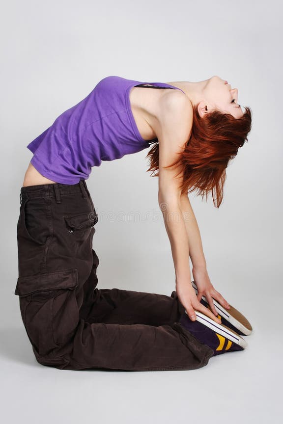 Girl Standing on Knees and Bending Back Stock Photo - Image of knee ...
