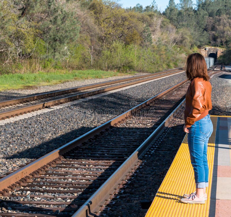 Girl Standing Near Train Rails Stock Image - Image of rails, jeans ...