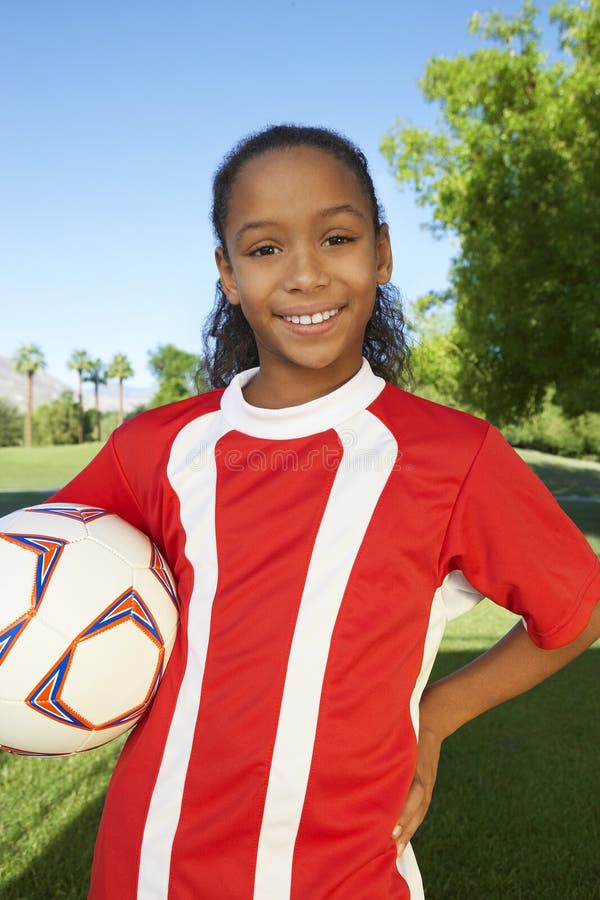 Girl Standing with Soccer Ball Stock Photo - Image of mixed, race: 29658244