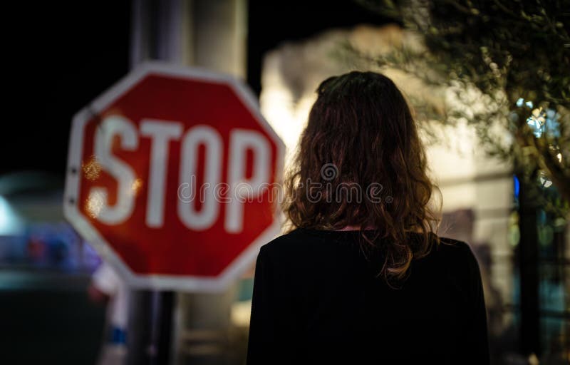 Girl at a stop sign stock image. Image of sign, roadwork - 313146353
