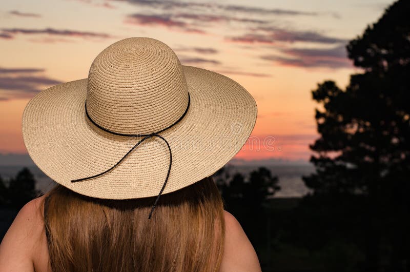 Girl in Straw Hat Looking at the Sunset. Back View Stock Photo - Image ...