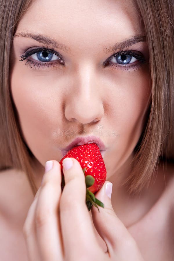 Girl with strawberry stock photo. Image of alluring, fresh - 20913276