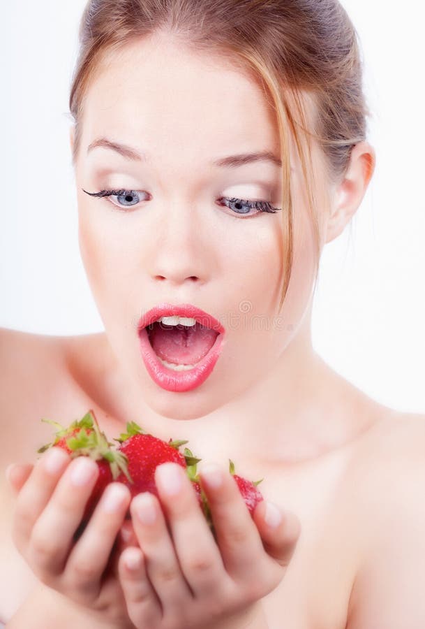 Girl with strawberry stock photo. Image of beautiful - 23827046