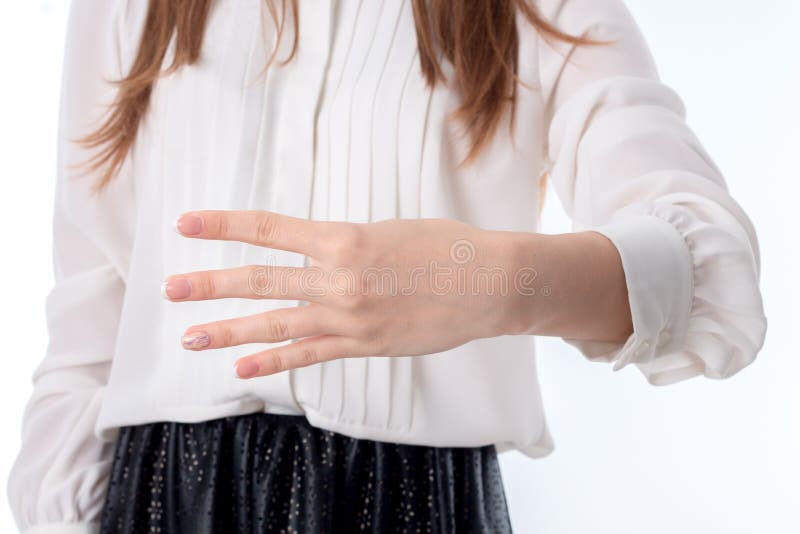 Girl Stretched Forth a Hand and Four Fingers Shows Close-up Stock Photo ...