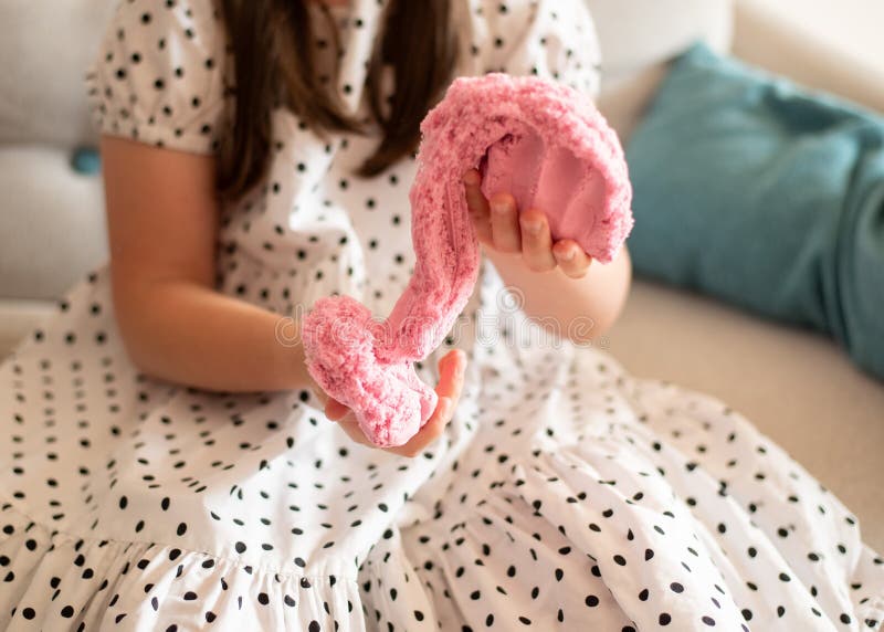 Girl Stretching Slime. Girl Playing with Pink Slime Stock Photo - Image ...