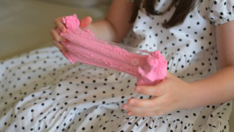 Girl Stretching Slime. Girl Playing with Pink Slime Stock Footage ...