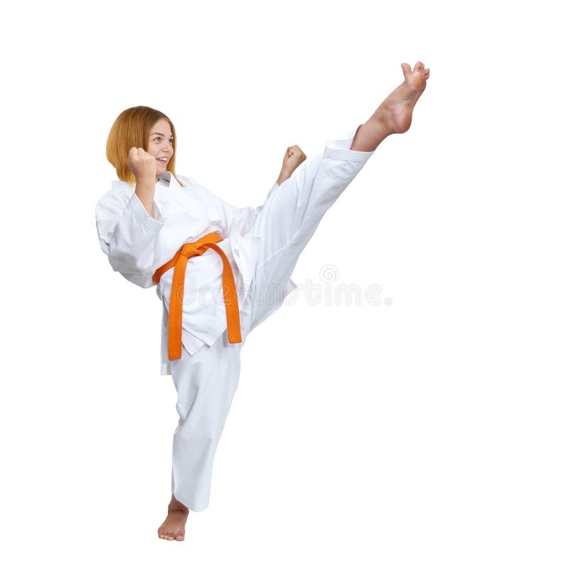 A Girl Strikes with a Kick Forward on a White Background Stock Image ...