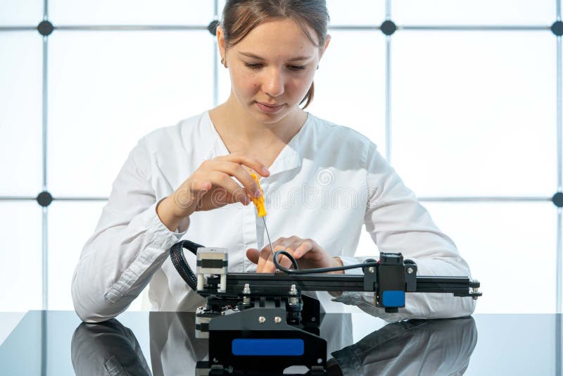 Girl Student Assembling Electronic Devices in the Robotics Laboratory ...