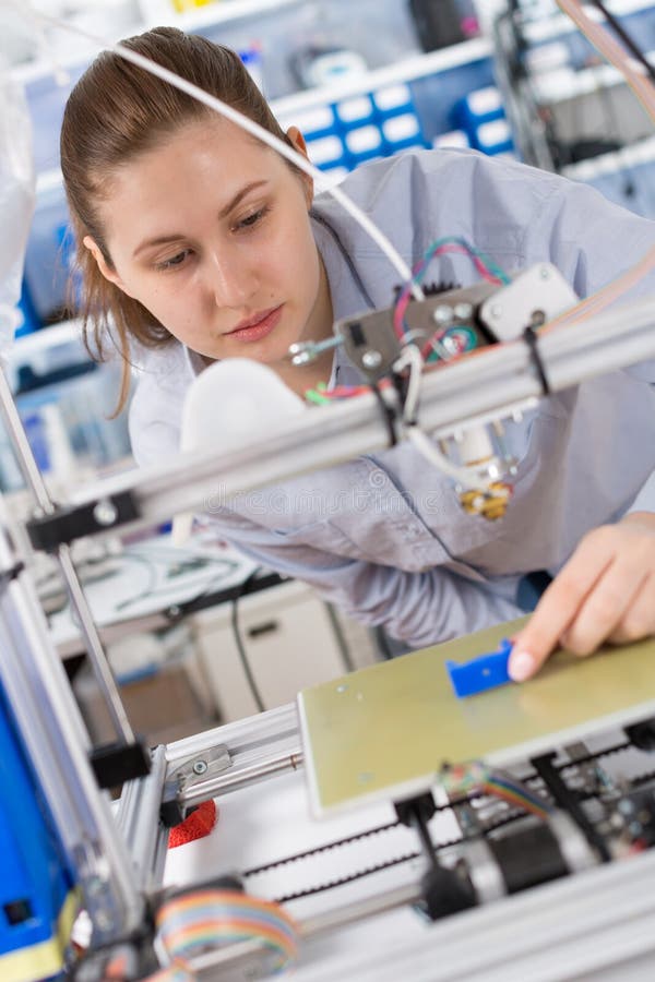 Girl Student Makes the Item on 3D Printer Stock Photo - Image of item ...