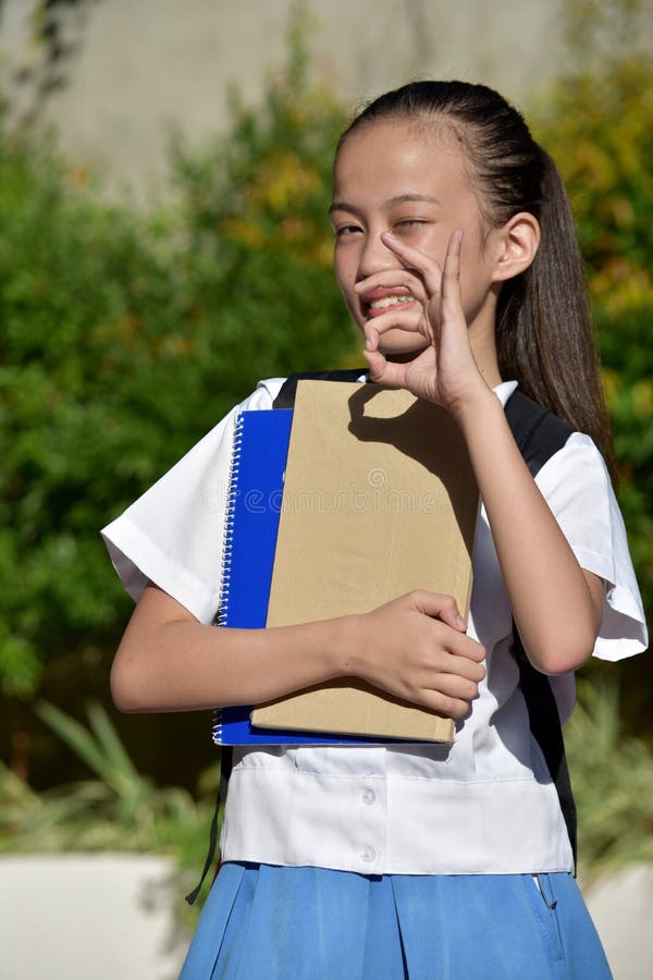 Girl Student and Okay Sign with Textbooks Stock Image - Image of books ...